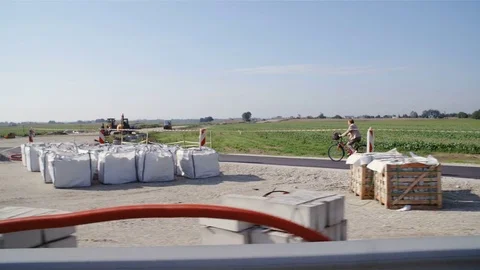 Driving by a Construction Site Car Side ... | Stock Video | Pond5