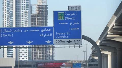 Driving in Dubai UAE, Road Signs Above H... | Stock Video | Pond5