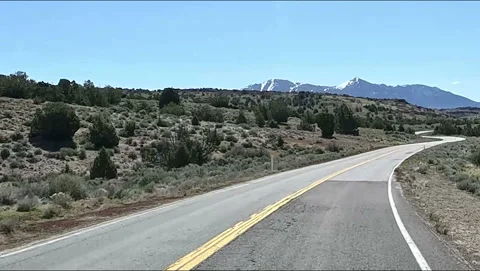 driving high desert winding road with mo... | Stock Video | Pond5