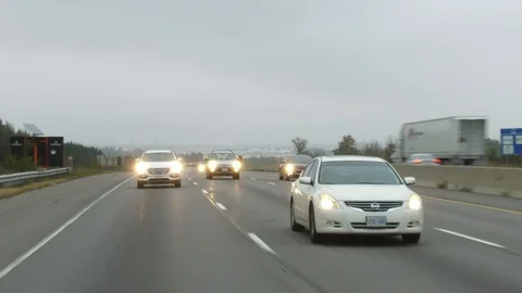 Driving plate car traffic POV on highway | Stock Video | Pond5