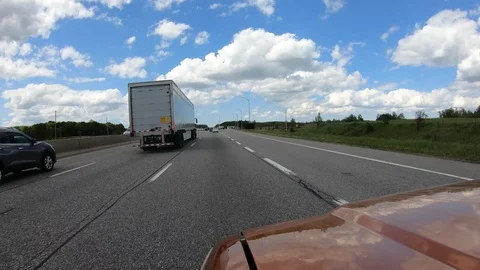 Driving plate POV truck and car driving ... | Stock Video | Pond5