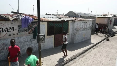 Driving through Cite Soleil slum area. H... | Stock Video | Pond5