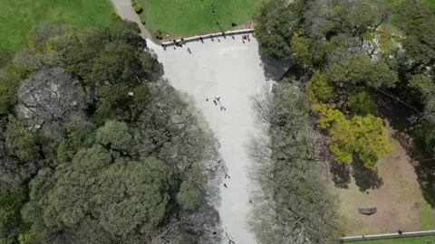 Dron view of People walking at a park in... | Stock Video | Pond5