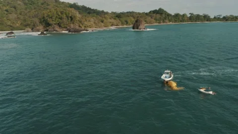 Drone aerial shot of a boat and a jet-sk... | Stock Video | Pond5