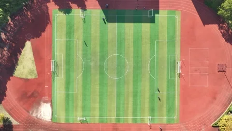 Drone aerial view of people at the footb... | Stock Video | Pond5