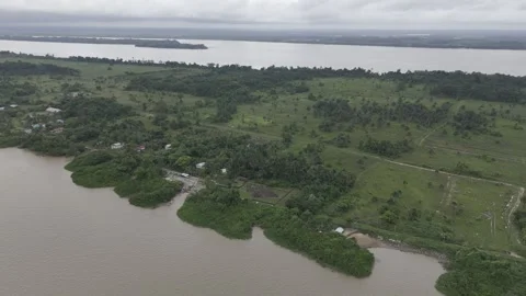 Drone descends on island in Essequibo Ri... | Stock Video | Pond5