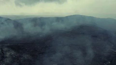 Drone Flies Over Hot Lava Field With Smo... | Stock Video | Pond5