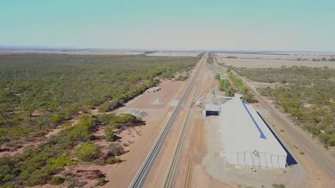 Drone flight above train track and grain... | Stock Video | Pond5