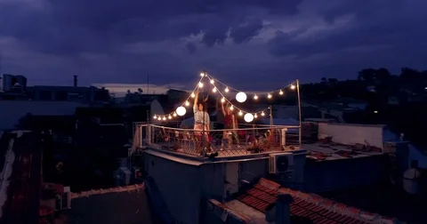 Drone Flight Over Rooftop Diverse Young ... | Stock Video | Pond5