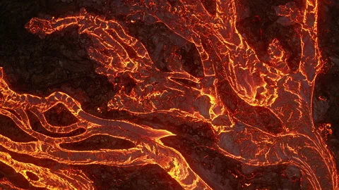 Drone flying above lava veins in Iceland... | Stock Video | Pond5