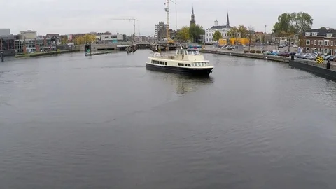 Drone flying over boat with city skyline... | Stock Video | Pond5