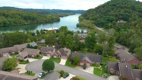 Drone flying over neighborhood near Melt... | Stock Video | Pond5