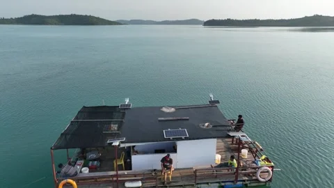 Drone Footage Fishing using Wooden Raft ... | Stock Video | Pond5