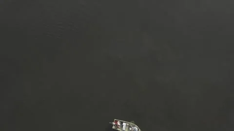 Drone Overhead Shot of Boat on Lake - Ri... | Stock Video | Pond5