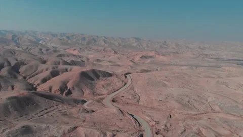 Drone shot of a desert with hills, roads... | Stock Video | Pond5