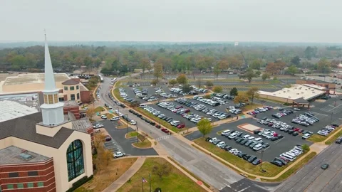 Drone shot of a mega church with a full ... | Stock Video | Pond5