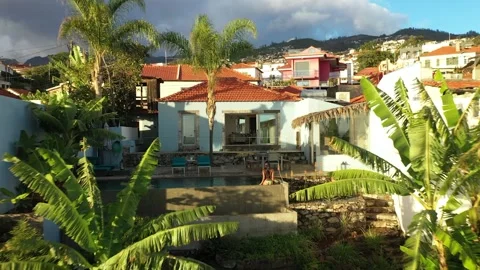 Drone shot moving backwards from a small... | Stock Video | Pond5