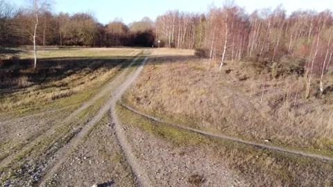 Drone shot over a pathway at the public ... | Stock Video | Pond5