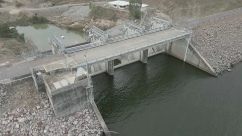 Drone shot of Ross River Dam Gate in Tow... | Stock Video | Pond5