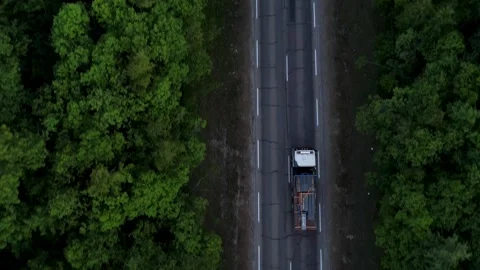 Drone Side View Camera Tracking Car Driv... | Stock Video | Pond5