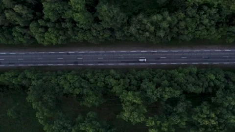 Drone Side View Camera Tracking Car Driv... | Stock Video | Pond5