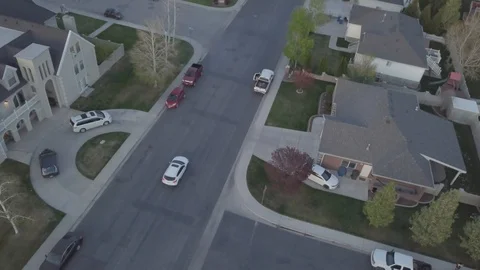 drone view of car driving in suburban ne... | Stock Video | Pond5