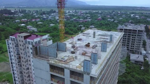 Drone view of a multi-storey building un... | Stock Video | Pond5