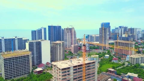 Drone view of a multi-storey building un... | Stock Video | Pond5