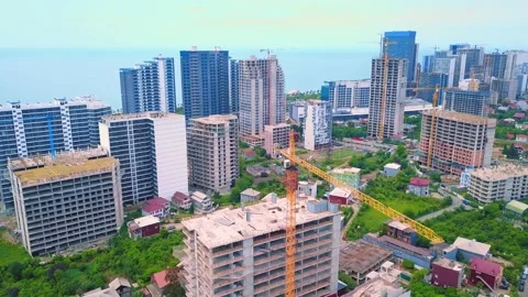 Drone view of a multi-storey building un... | Stock Video | Pond5