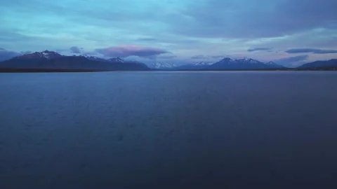 Drone view over a calm sea under a cloud... | Stock Video | Pond5