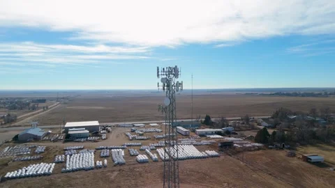 Drone's Eye View Rural Town's Cell Tower... | Stock Video | Pond5
