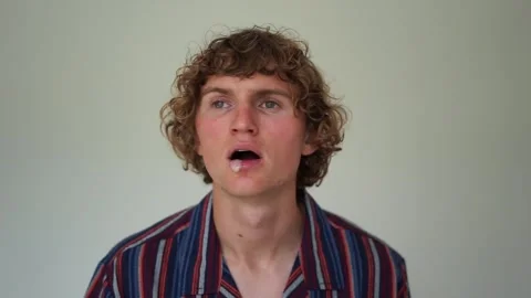 Drooling Stock Video Footage | Royalty Free Drooling Videos | Pond5