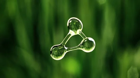 Drop falls and breaks down into the form... | Stock Video | Pond5