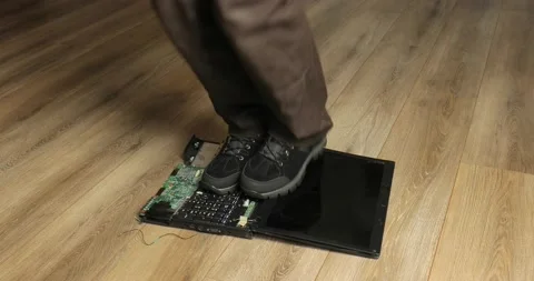 Smashing Laptop Stock Footage ~ Royalty Free Stock Videos | Pond5