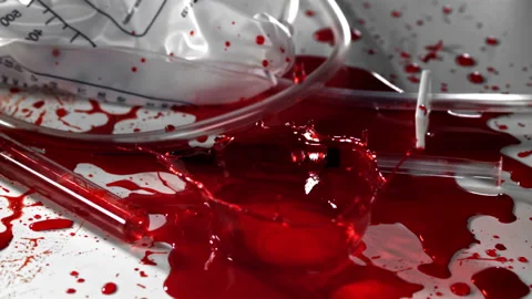 Drops of blood fall on the table. Filmed... | Stock Video | Pond5