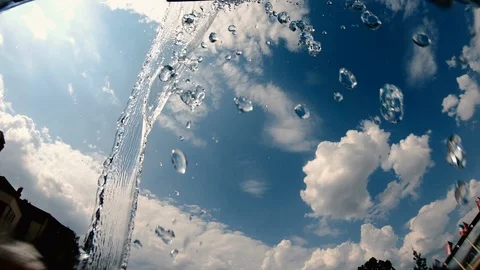 Drops falling drom water jet in a pool, ... | Stock Video | Pond5