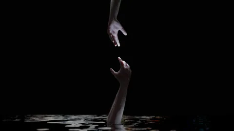 Drowning arm helping hand reaching out a... | Stock Video | Pond5