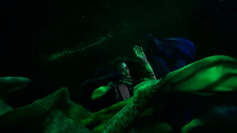 drowning woman and mysterious mermaid in... | Stock Video | Pond5