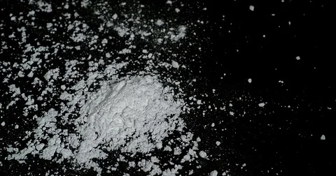 Drug, Cocaine falling against black back... | Stock Video | Pond5