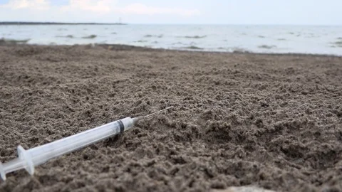Drug injection needle and syringe on the... | Stock Video | Pond5
