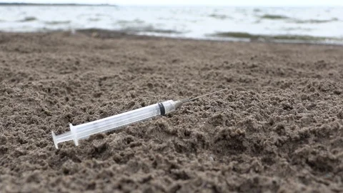 Drug injection needle and syringe on the... | Stock Video | Pond5
