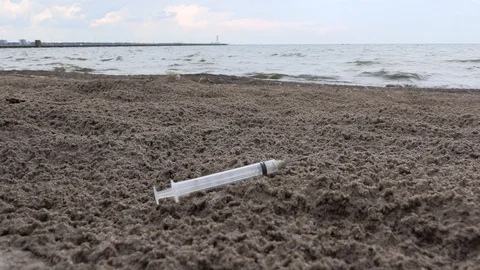 Drug injection needle and syringe on the... | Stock Video | Pond5