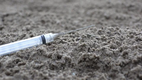 Drug injection needle and syringe on the... | Stock Video | Pond5