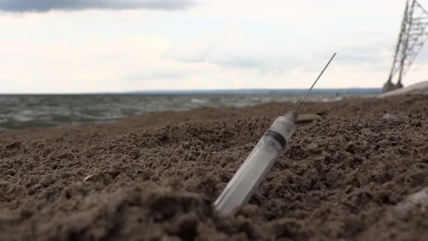 Drug injection needle and syringe on the... | Stock Video | Pond5