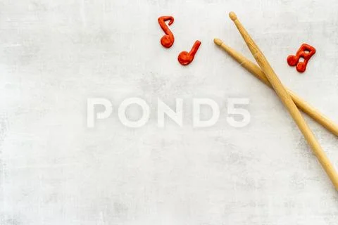 Drum sticks with music notes, overhead view. Music background Stock ...