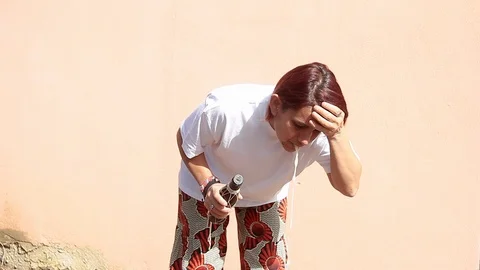 drunk girl standing up vomiting in front... | Stock Video | Pond5