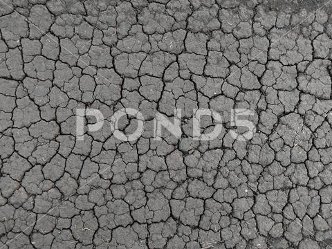 Dry cracked soil texture and background of ground. dried ground covered ...