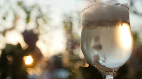 Dry ice on a glass of wine at a receptio... | Stock Video | Pond5