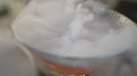Dry ice on two cocktails at a reception ... | Stock Video | Pond5