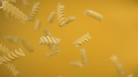 Dry pasta fusili falling diagonally on a... | Stock Video | Pond5